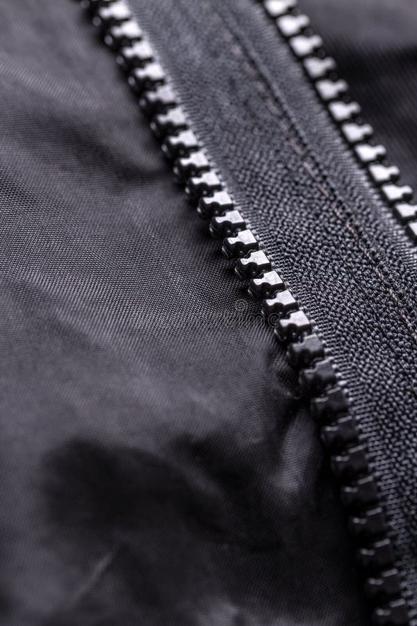 Zipper on black material stock image. Image of concept - 71894979