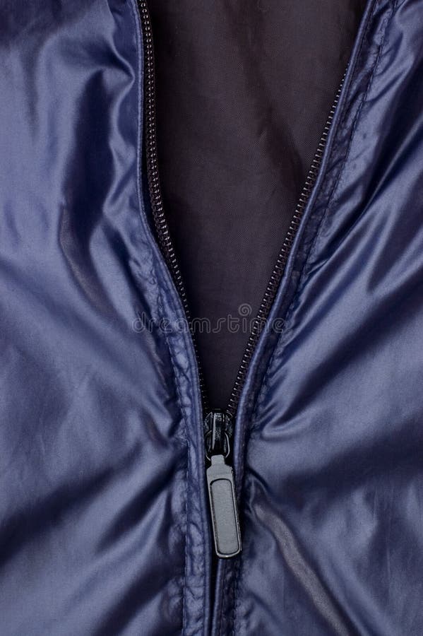 Zipper of a blue jacket stock image. Image of undressing - 23623569