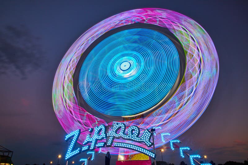 Zipper Carnival Ride Blurred into Full Circle of Colorful Lights during ...