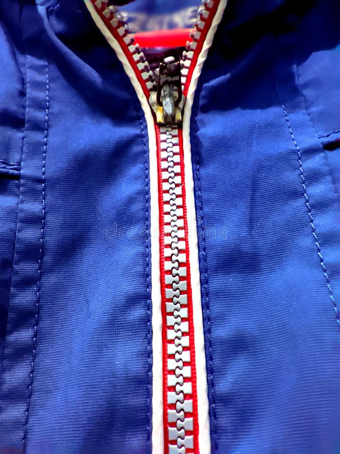Zipper with Silver Teeth on a Blue Fabric Jacket Stock Image - Image of ...