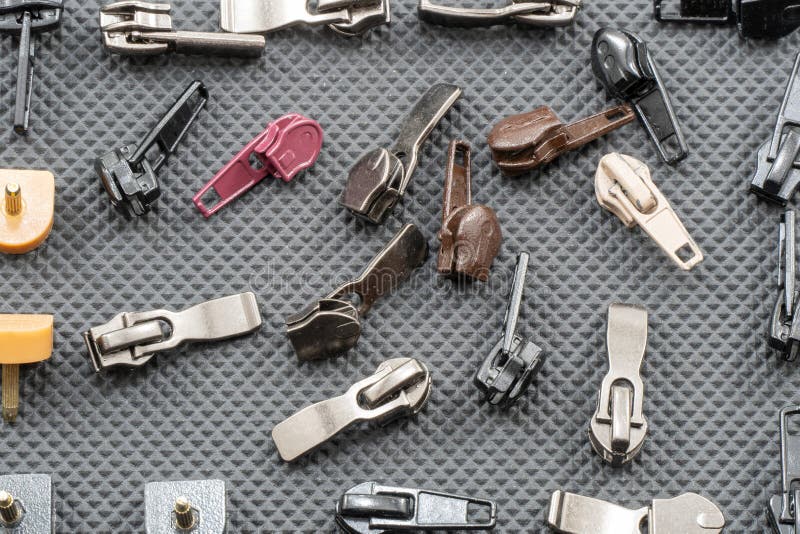 Zipper Slider. Accessories for Repair and Tailoring Stock Image - Image ...