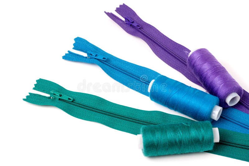 Zipper with a Spool of Thread Isolated on White Background Stock Photo ...