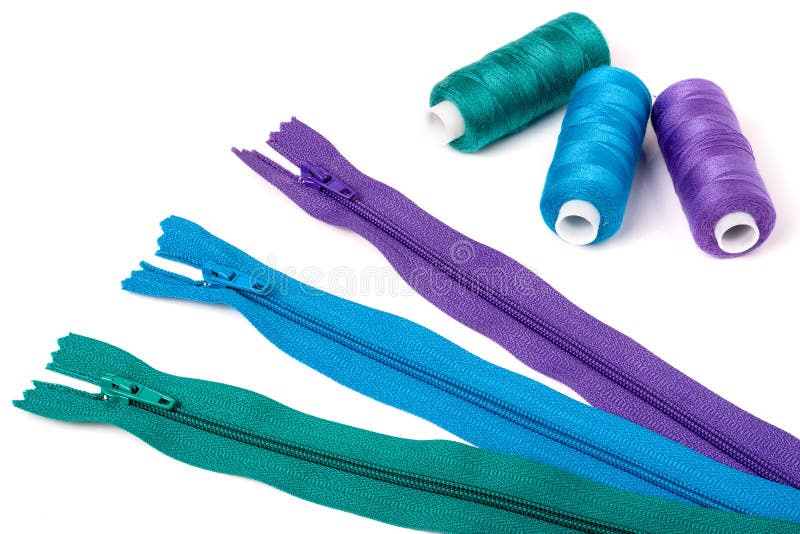 Zipper with a Spool of Thread Isolated on White Background Stock Photo ...