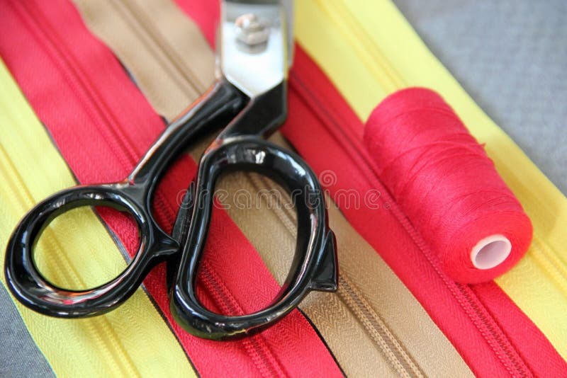 Zippers , Scissors and a Spool of Thread Stock Photo - Image of hobby ...