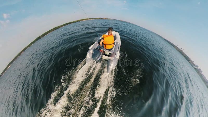 Zoom-in of a 360-degree Panorama of a Man on a Dinghy Stock Video ...