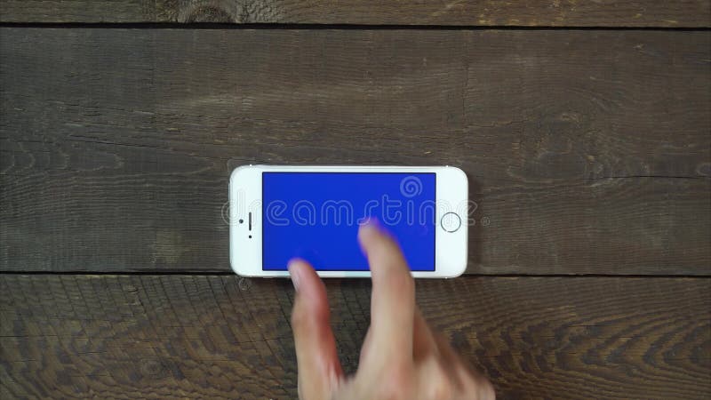 Zoom in Hand Smartphone with Blue Screen Stock Video - Video of mockup ...