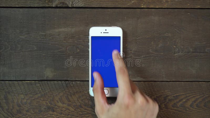 Zoom in Hand Smartphone with Blue Screen Stock Footage - Video of ...