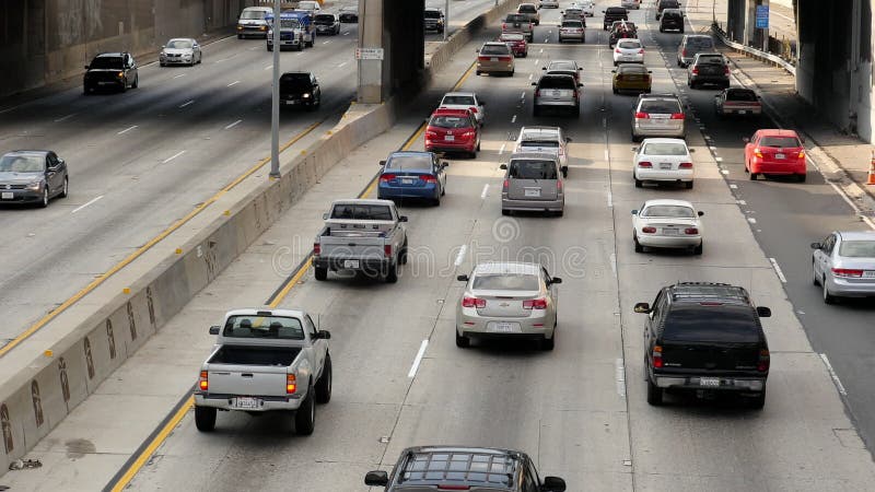 Zoom Out /Time Lapse of Traffic on Busy Freeway in Downtown Los Angeles ...