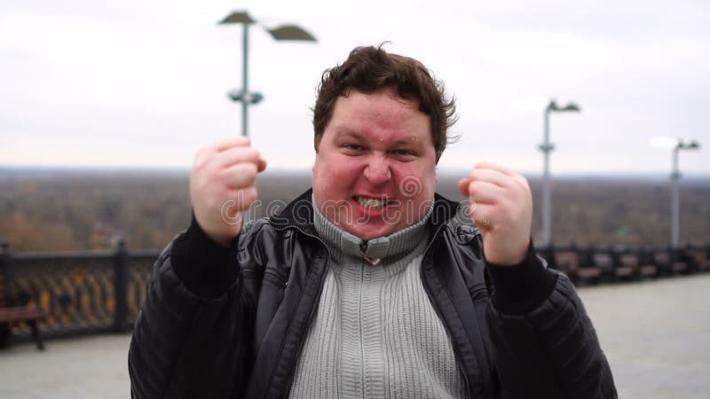 Zoom in Portrait of Happy Surprised Fat Man Looking Directly at Camera ...