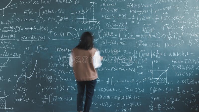 Zoom-in Time Lapse of Young Lady Researcher Solving Equations Writing ...