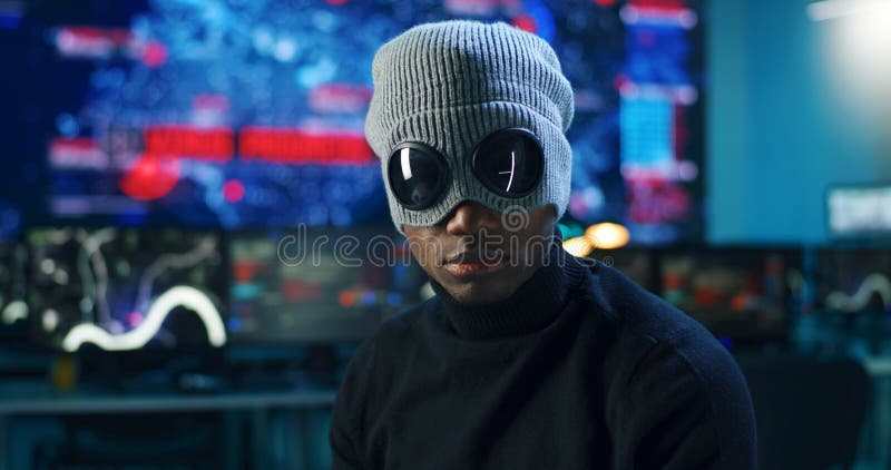 Black Man Hacking Computer System in Server Room Stock Photo - Image of ...
