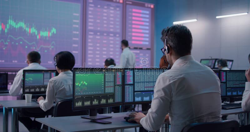 Male Trader Using Computer To Trade Stocks Stock Video - Video of plan ...