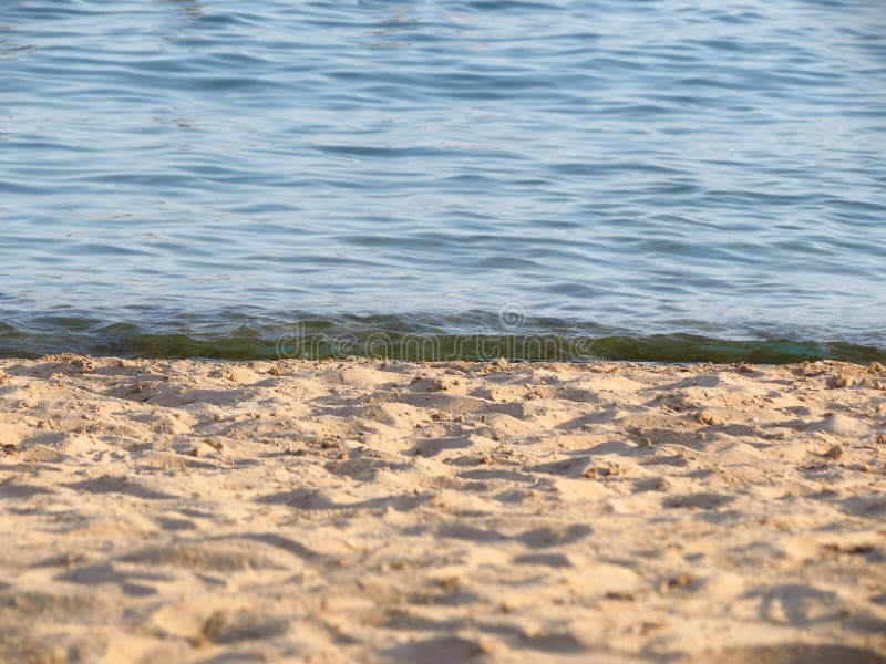 Zoomed in sea and sand stock photo. Image of nature - 229504742
