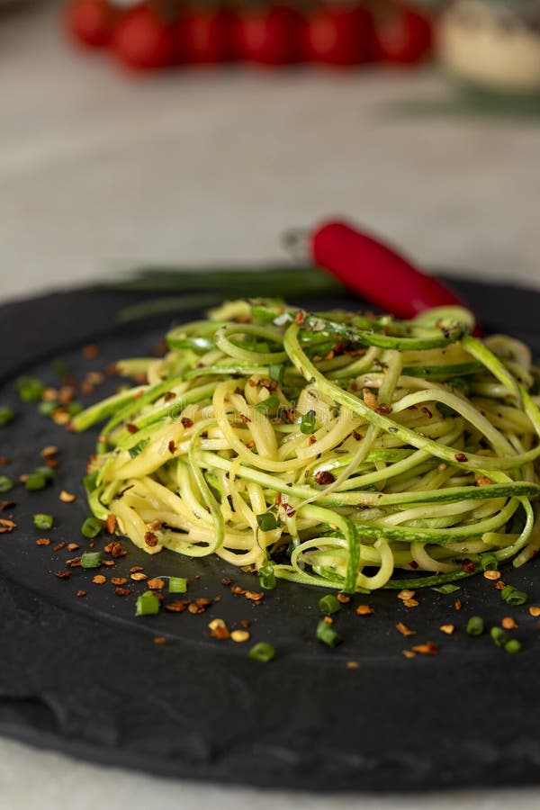 Zucchini Spaghetti with Dehydrated Pepperoni Pepper Stock Image - Image ...