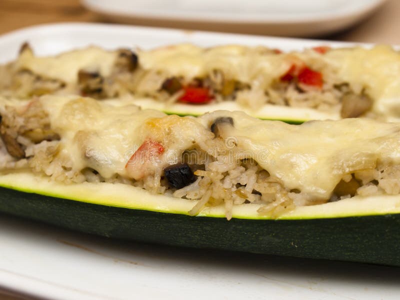 Zucchini stuffed with rice stock image. Image of cheese - 58583339