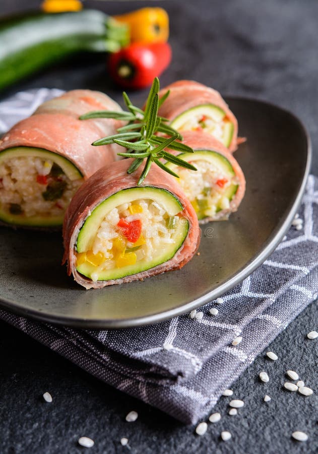 Zucchini Stuffed with Rice, Cheese, Pepper and Wrapped in Prosciutto ...
