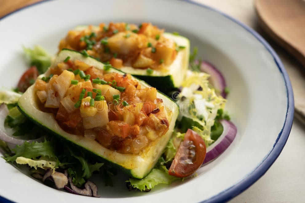 Zucchini Stuffed with Vegetables and Fresh Hake. Stock Image - Image of ...