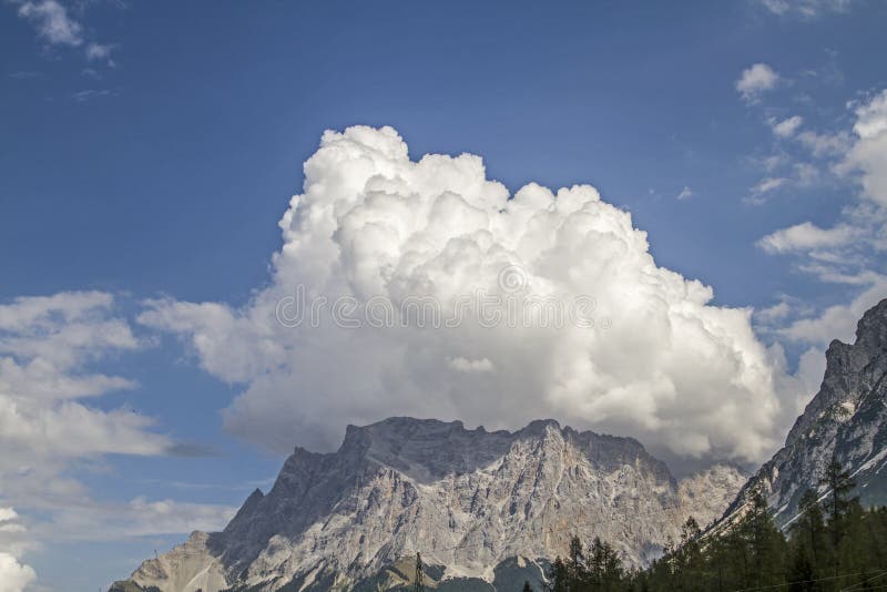 Zugspitze with cloud hat stock image. Image of austria - 133905035