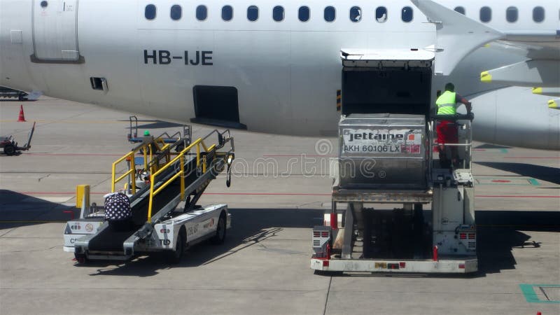 Loading Luggage of a Special Car into the Plane Bus Airfield Airport ...