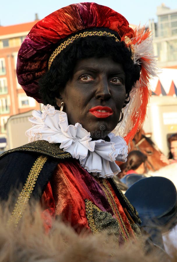 Zwarte Piet met zak stock afbeelding. Image of nederland - 16232995