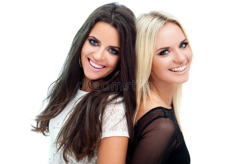 Zwei Lächelnde Freundinnen – Blond Und Brünett Stockfoto - Bild von ...