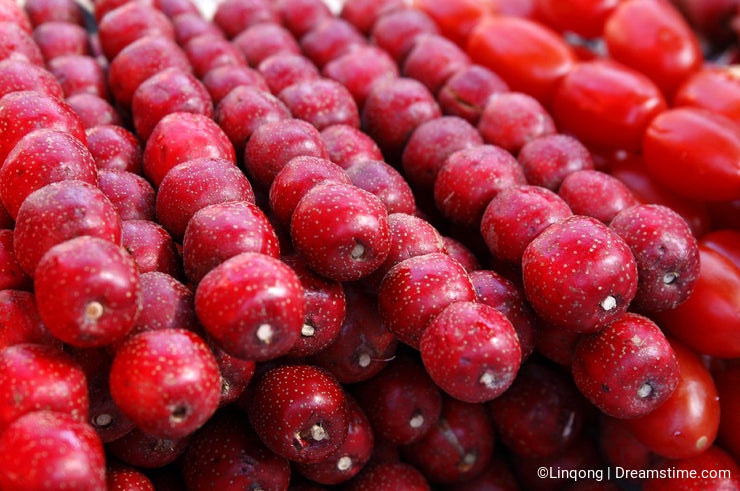 Candied haws on a stick. - Dreamstime