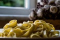 Bowl of plain cooked tagliatelle pasta - Free Stock Image