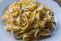 Bowl of plain cooked tagliatelle pasta - Free Stock Image