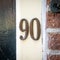 House number 90 stock photo. Image of house, digit, brown - 160968038