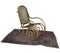 Rocking chair on old rug stock photo. Image of background - 32279468