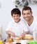 Smiling Father and Son Preparing a Toast Stock Image - Image of ...