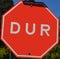Stop sign DUR stock photo. Image of moving, language - 91679456