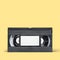 VHS Video Tape Cassette on Yellow Background Stock Photo - Image of ...