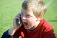 Angry Child Yelling At The Phone Stock Photo - Image of male, cute ...
