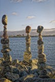Rock Balancing By The Ocean Stock Image - Image of stone, sunset: 302965
