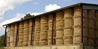 Stacked Hay Bales In Shed Stock Photo - Image: 26487920