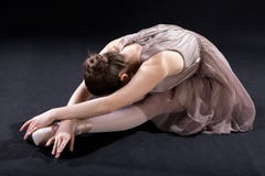 Ballerina Sitting And Bending Forward Stock Photo - Image of beautiful ...