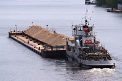 Barge Pushed By A Tugboat Royalty Free Stock Photo - Image: 11154445