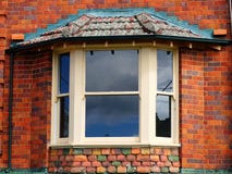 Brick House With Bay Window Stock Photo - Image: 5436980