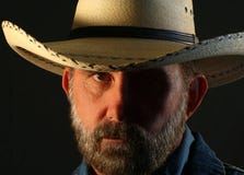Cowboy With Straw In His Mouth Stock Photo - Image: 20970240