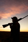 Hunter With Shotgun In Sunset Stock Photo - Image of sunset, sunrise ...
