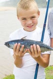 Boy Catches Fish Stock Photo - Image: 1198470