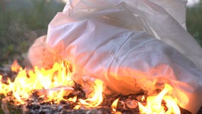 Burning White Cloth Or Dress On Ground Stock Video - Video of burn ...