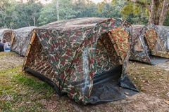 People camping in the rain stock image. Image of tree - 14099997