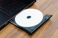 Laptop with DVD rom open stock photo. Image of lens, burn - 11354702