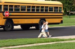 School Buses Driving In A Line Stock Image - Image of parked, passenger ...