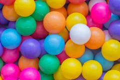 Kid in colourful fun balls stock photo. Image of color - 4917882