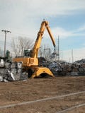 Scrap Yard Crane With Magnet Stock Photo - Image of industry, equipment ...