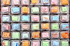 Colourful Petit Fours On A Cake Stand With Bokeh Stock Image - Image of ...