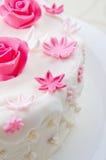 White Fondant Cake With Pink Flowers Stock Image - Image: 22225819